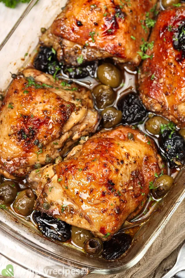 Chicken Marbella Recipe: Juicy Chicken Thighs Bathed in a Piquant Sauce